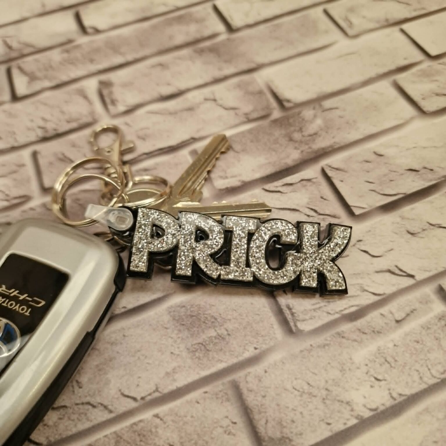 Prick keyring 2 layers - 4 pack